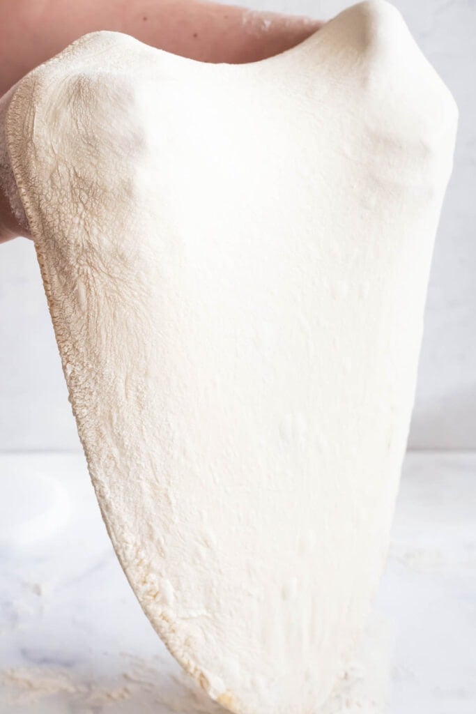 How to Hand Stretch Pizza Dough - With Visuals! » the practical kitchen