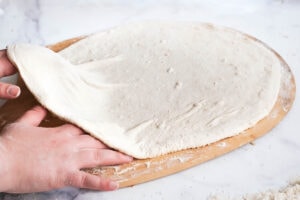 How to Hand Stretch Pizza Dough - With Visuals! » the practical kitchen