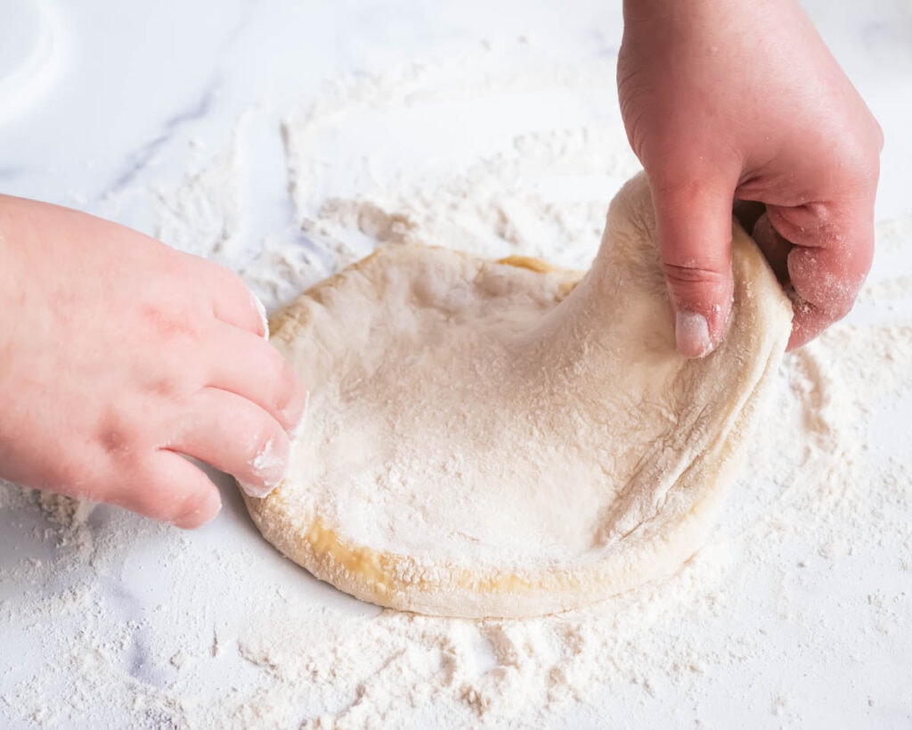 How to Hand Stretch Pizza Dough - With Visuals! » the practical kitchen