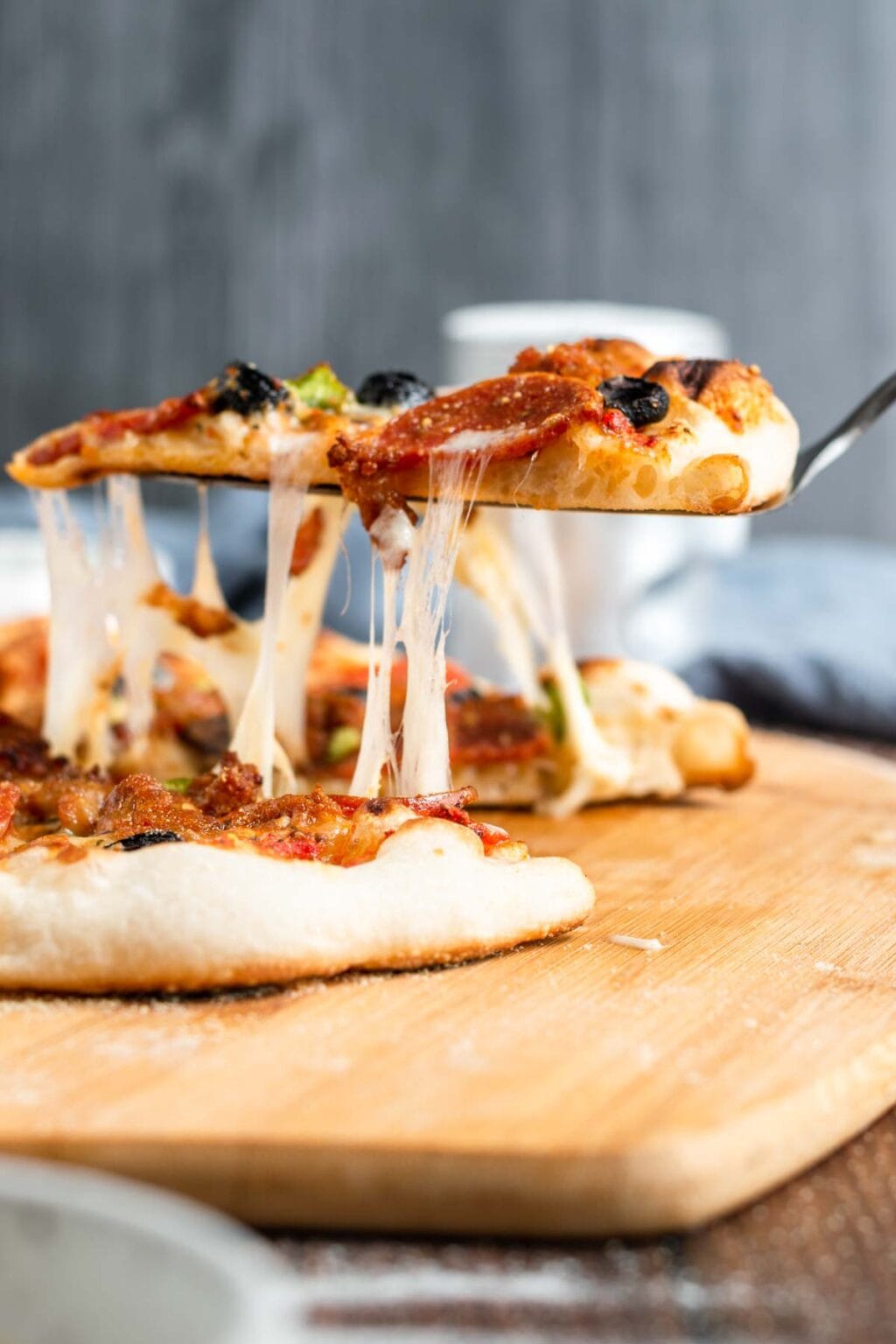 Crispy Thin Crust Homemade Supreme Pizza » the practical kitchen